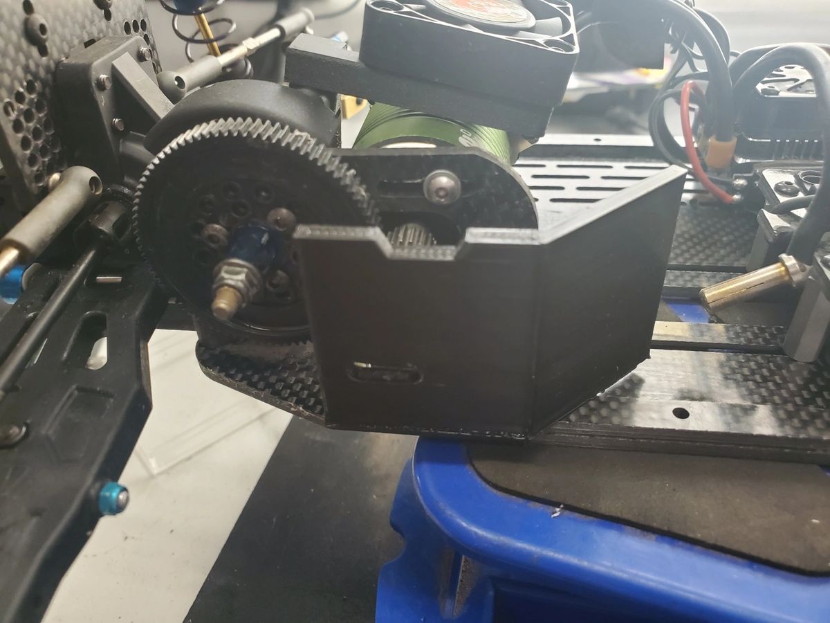 SPUR AND MOTOR ROCK GUARD