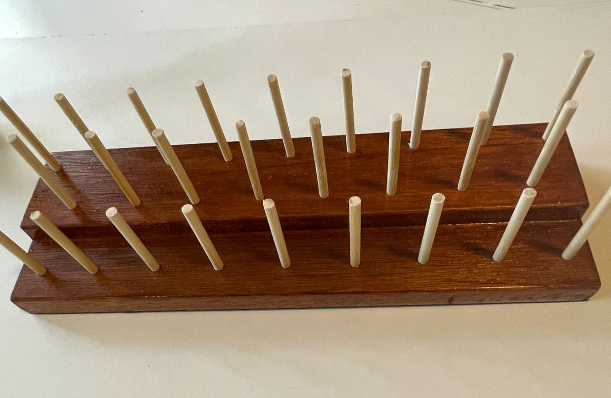 Smocking pleater thread feeder stand. Free standing to suit all pleaters