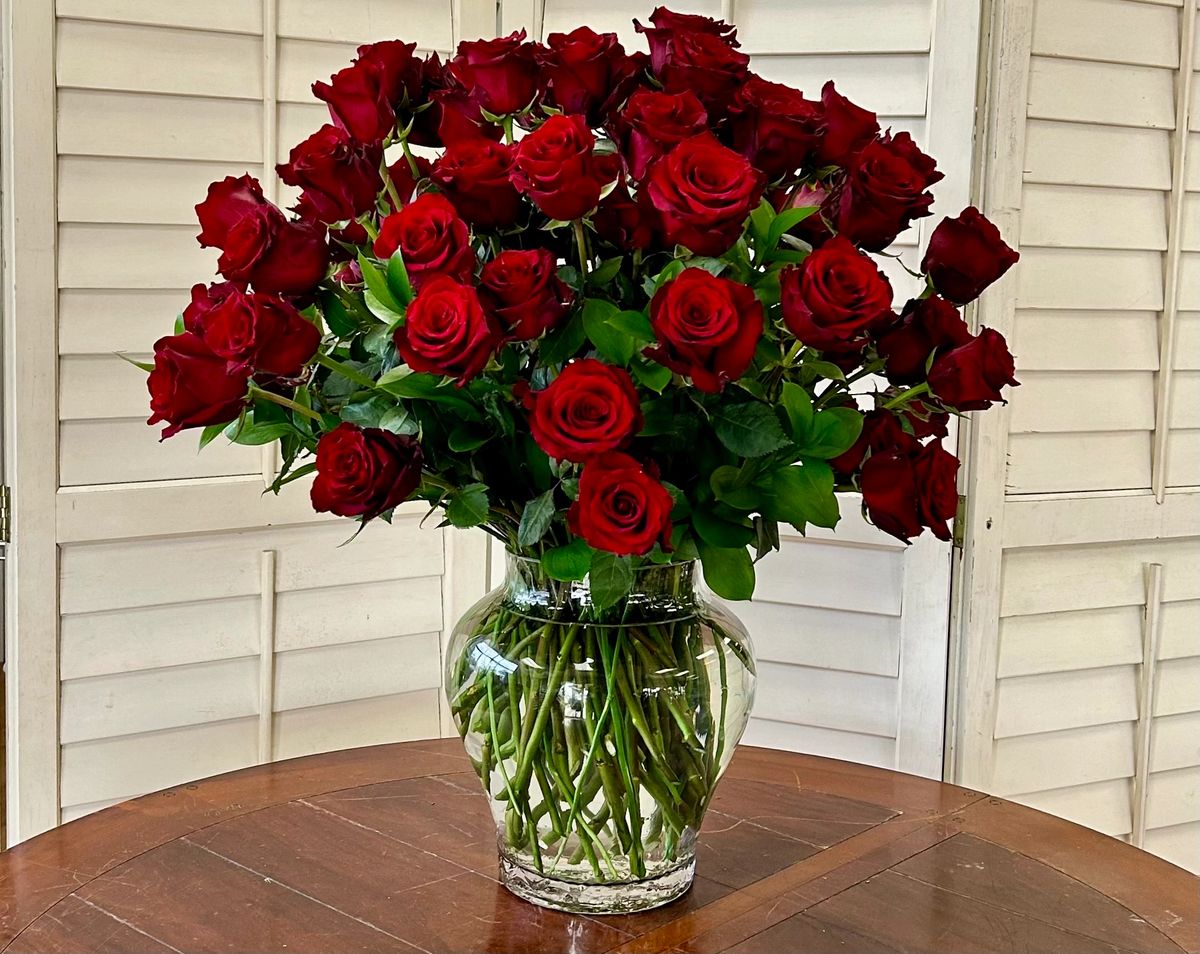 4 Dozen Roses Designed with our Ruby Red Roses. When the quality of ...