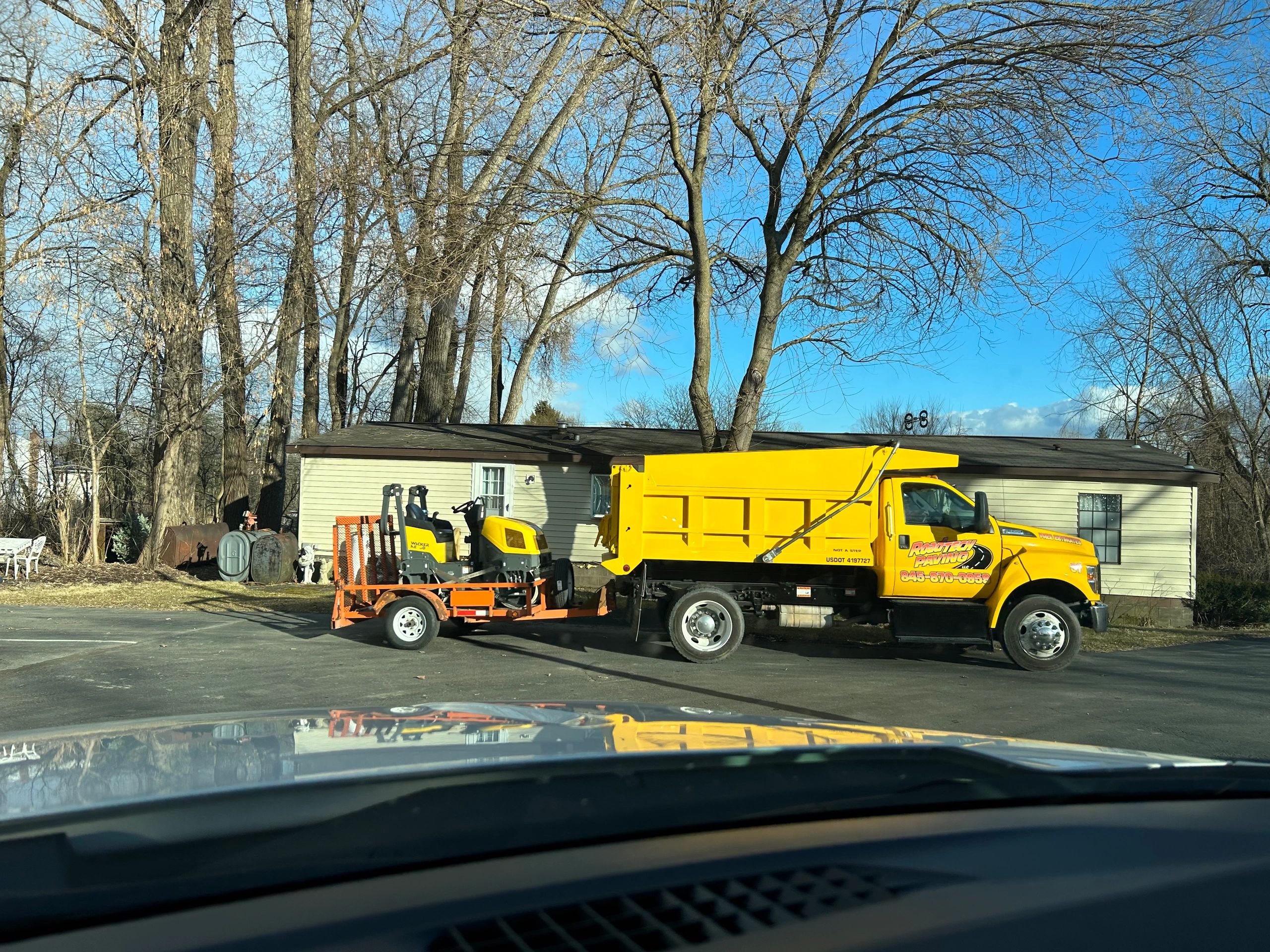 Road tech paving LLC