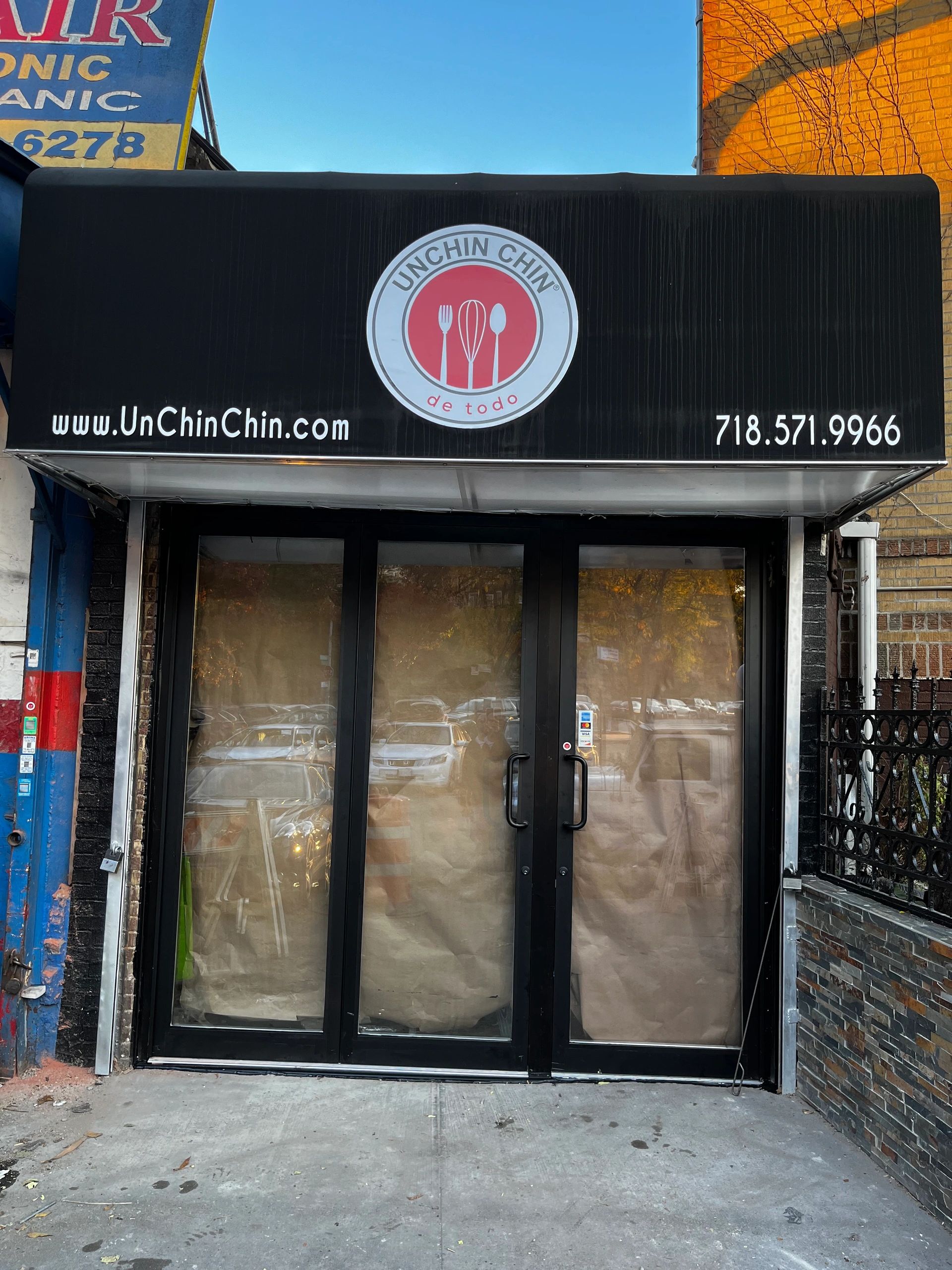 Our New Sliding Glass Storefront.