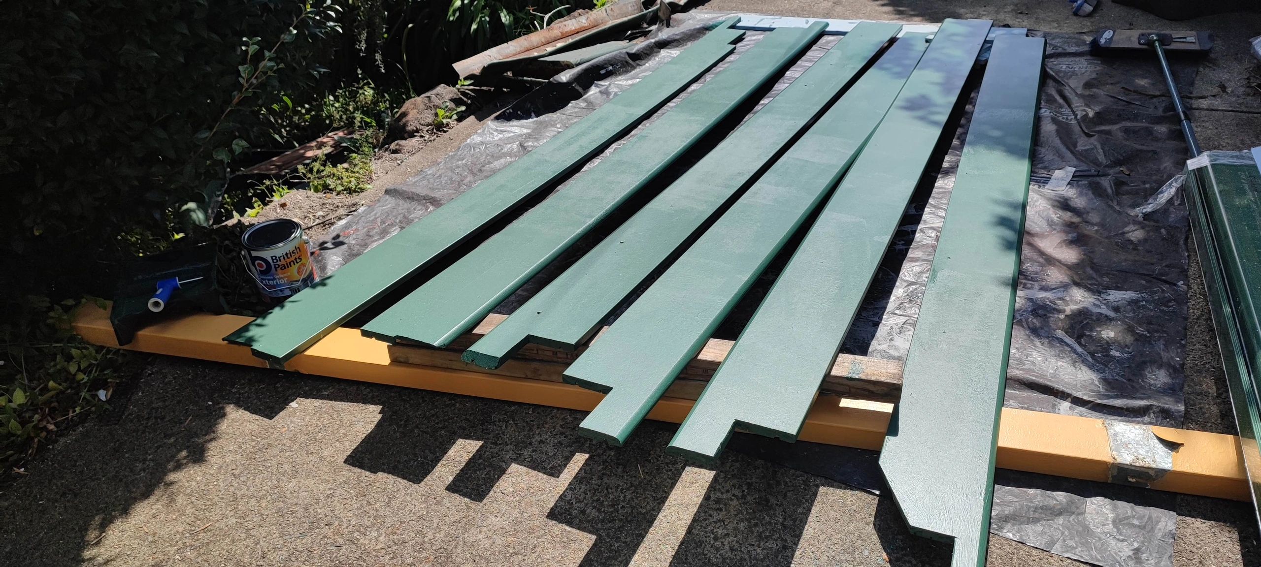 Paint and install timber gable capping boards