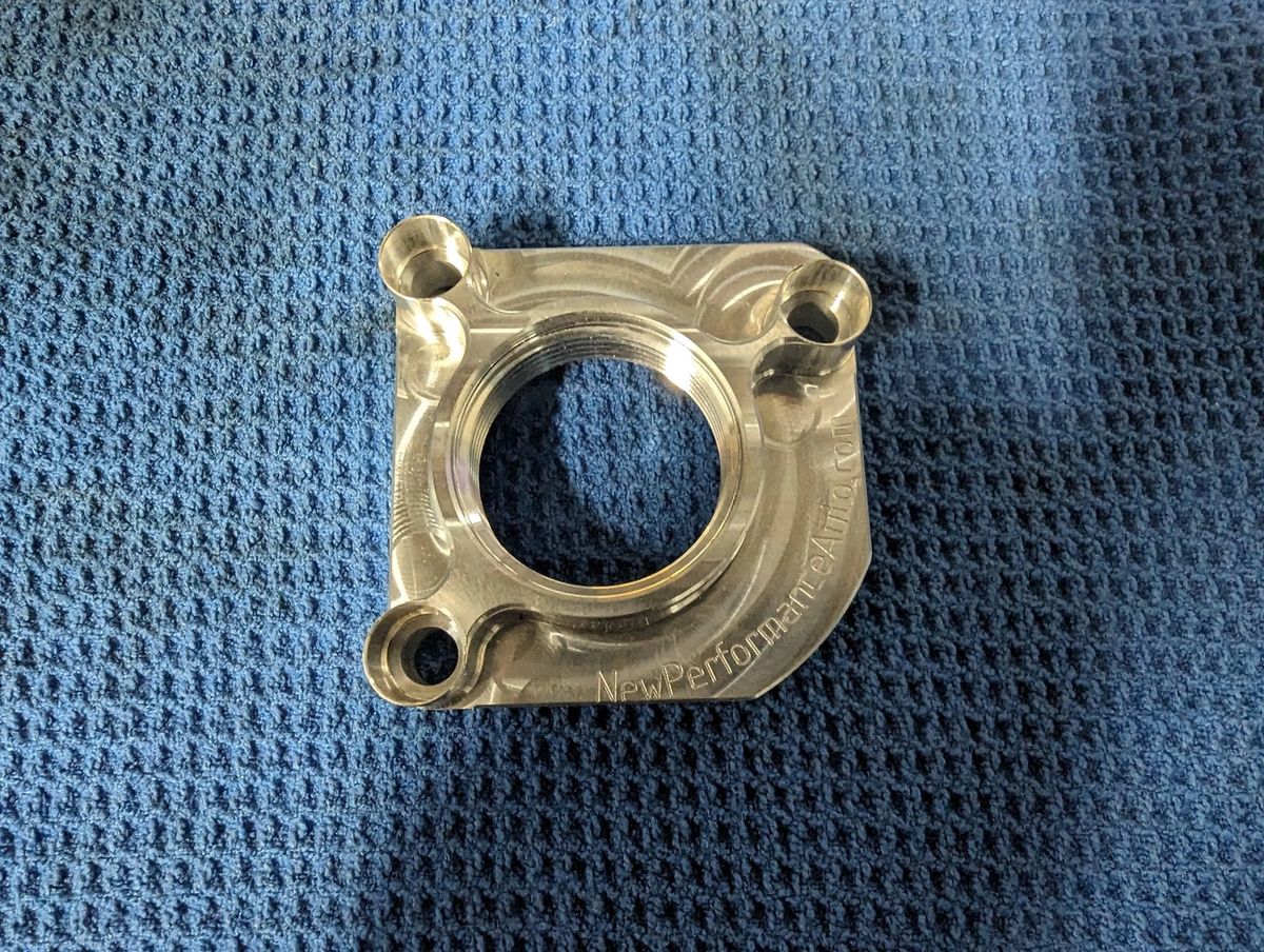 Upper coolant adapter for 12 valve and 4bt engines